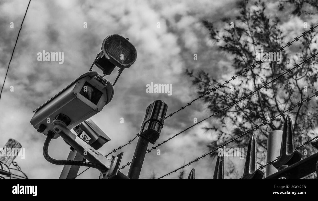 Grayscale of a surveillance camera on the street Stock Photo - Alamy