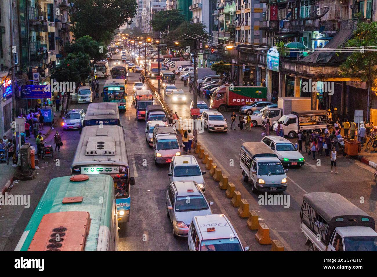 YANGON, MYANMAR - DECEMBER 15, 2016: Traffic on Mahabandoola Road in ...
