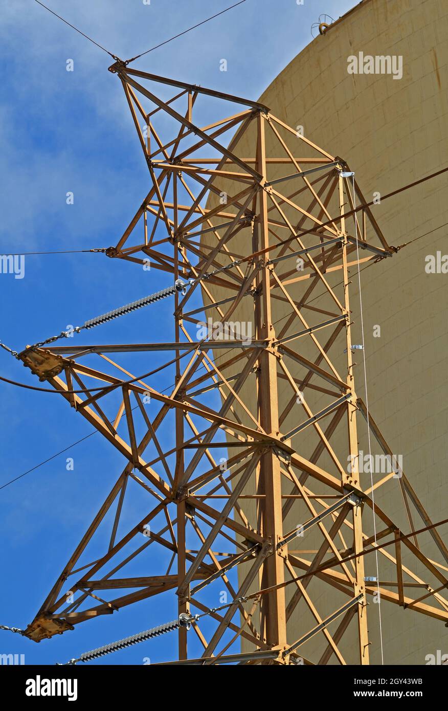 A transmission tower outside the power station leads the electricity ...