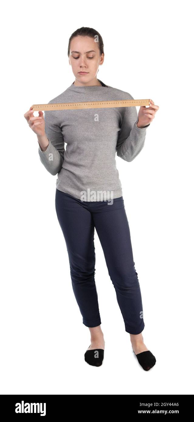 Woman holding ruler isolated on hi-res stock photography and images - Alamy