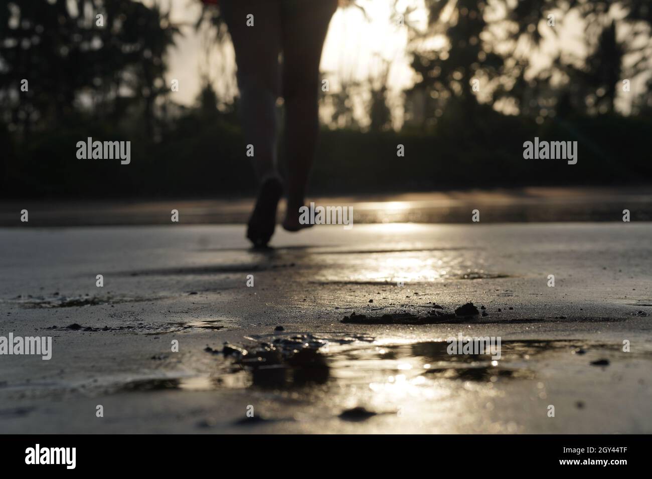 Barefoot running mud hi-res stock photography and images - Alamy