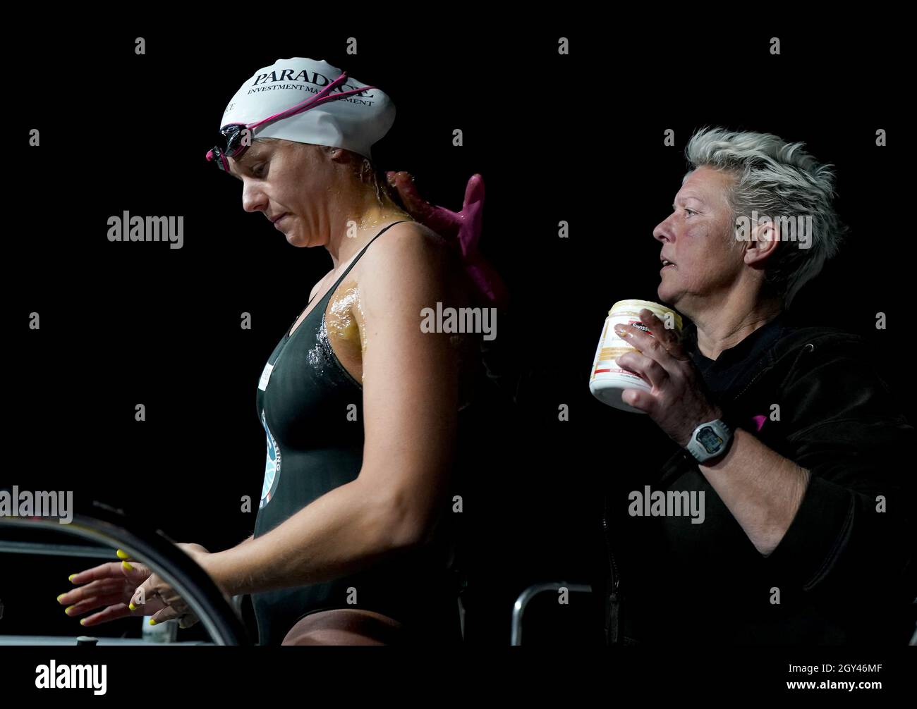 Endurance swimmer Chloe McCardel is prepared by crew member Caroline ...