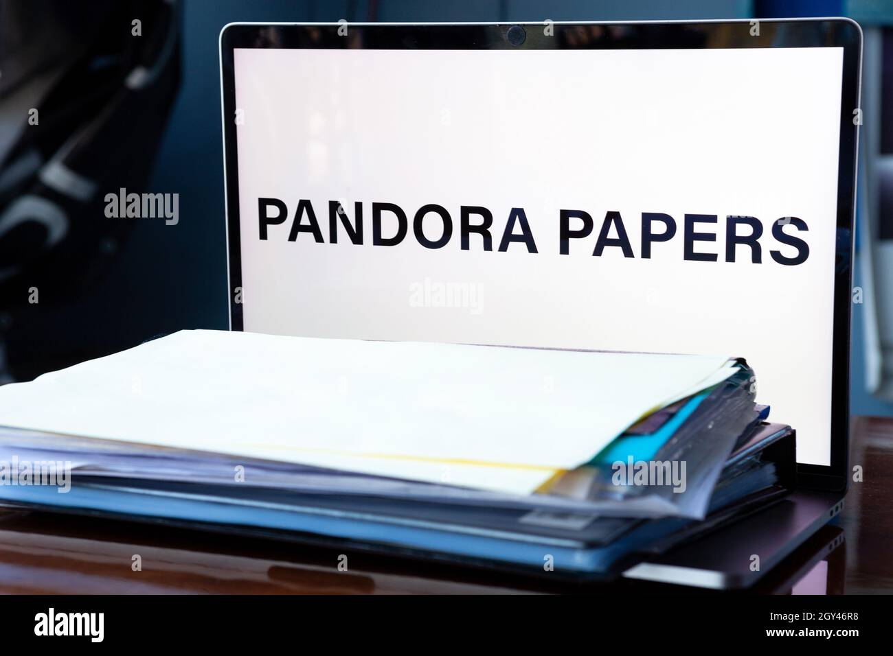Screen with Pandora papers inscription. Pandora Papers is 11.9 million leaked documents that ...