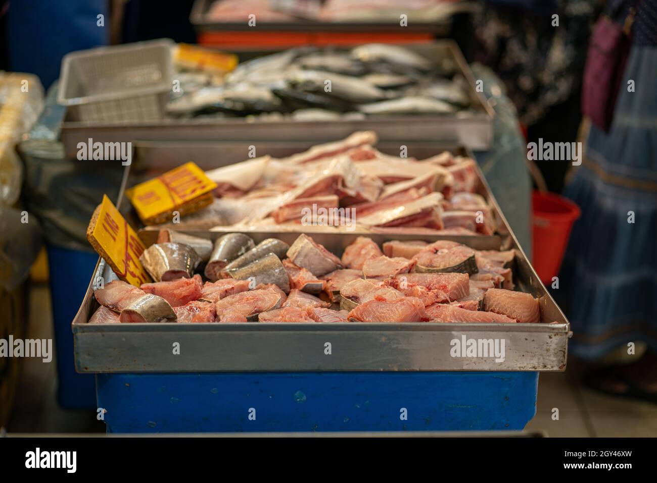 Different kinds of fish cut into pieces at wet market in Singapore ...