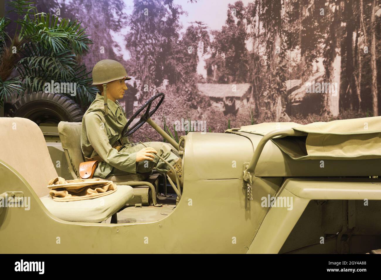 A diorama of a WWII era Willys Jeep, fitted for train, rail track use ...