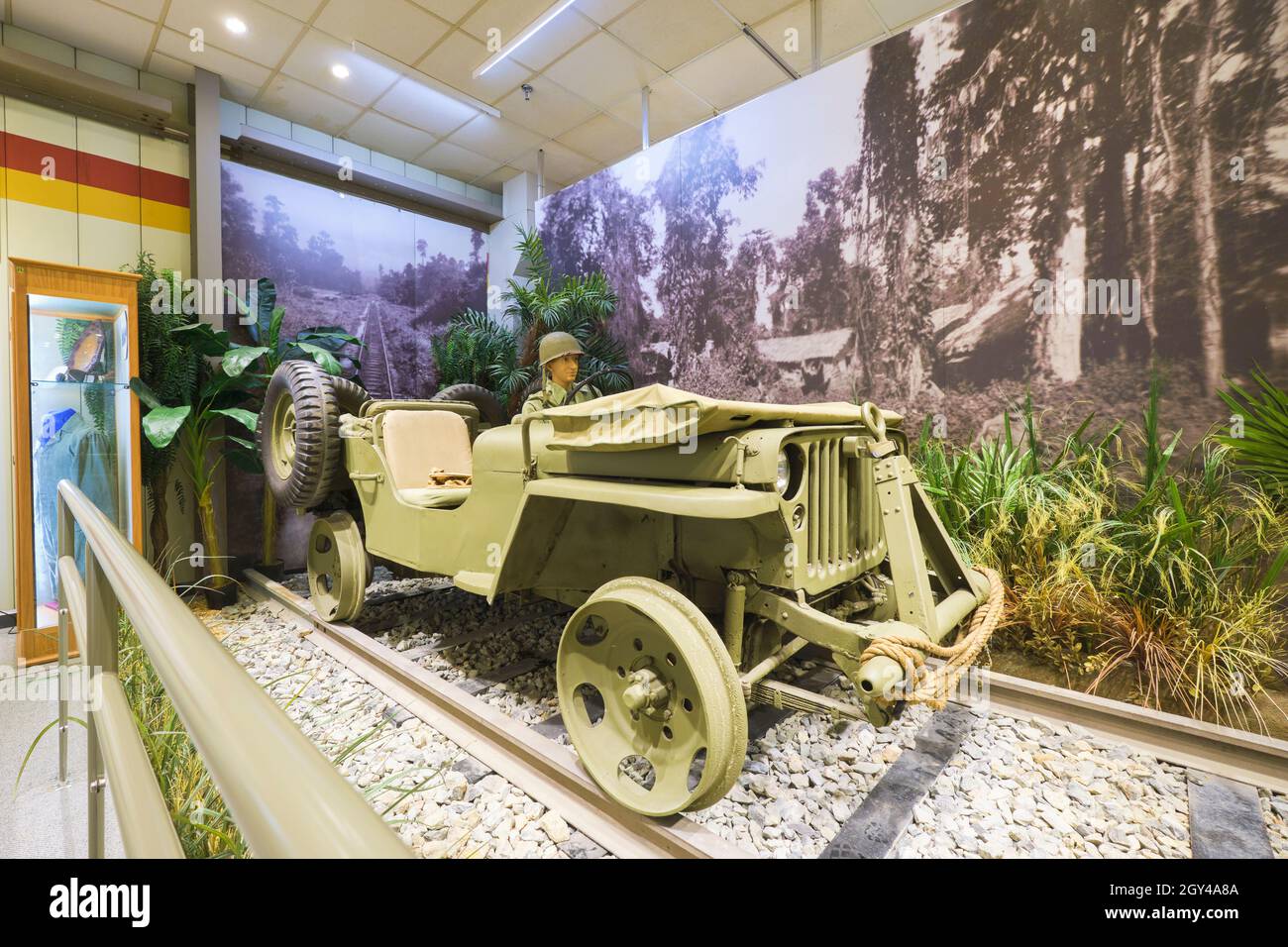 A diorama of a WWII era Willys Jeep, fitted for train, rail track use ...