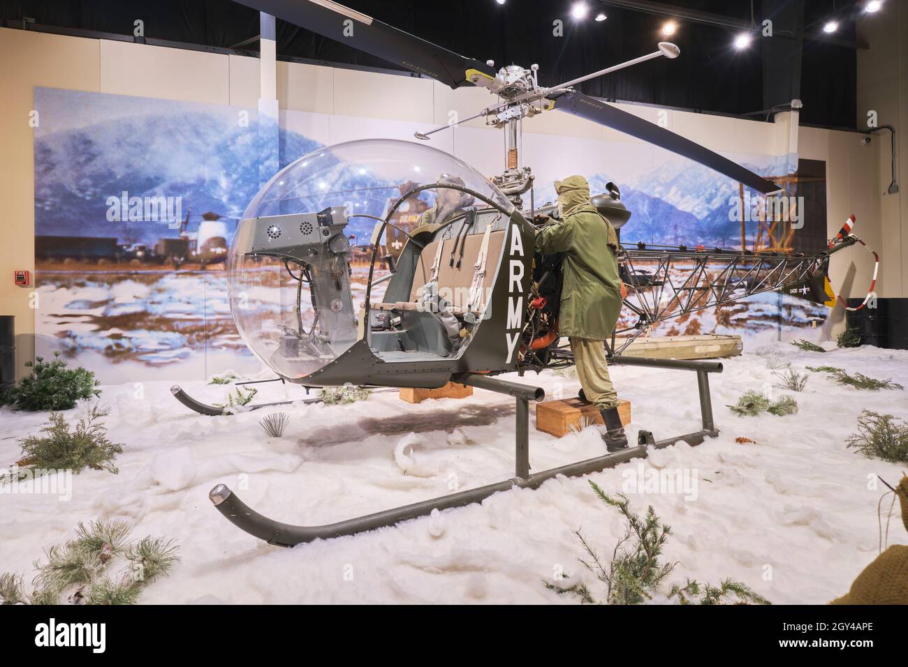 A Bell H-13E Sioux helicopter during a snowy winter in the Korean war ...