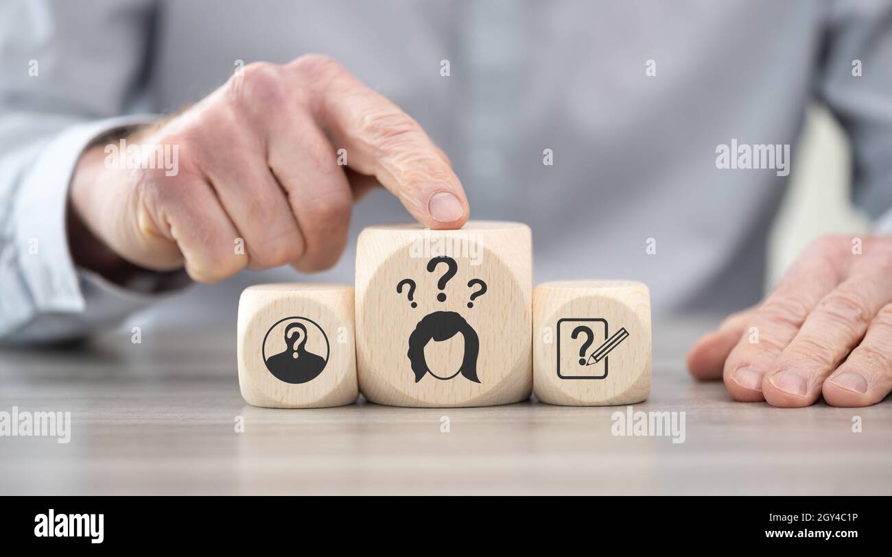 Wooden blocks with symbol of question concept Stock Photo - Alamy