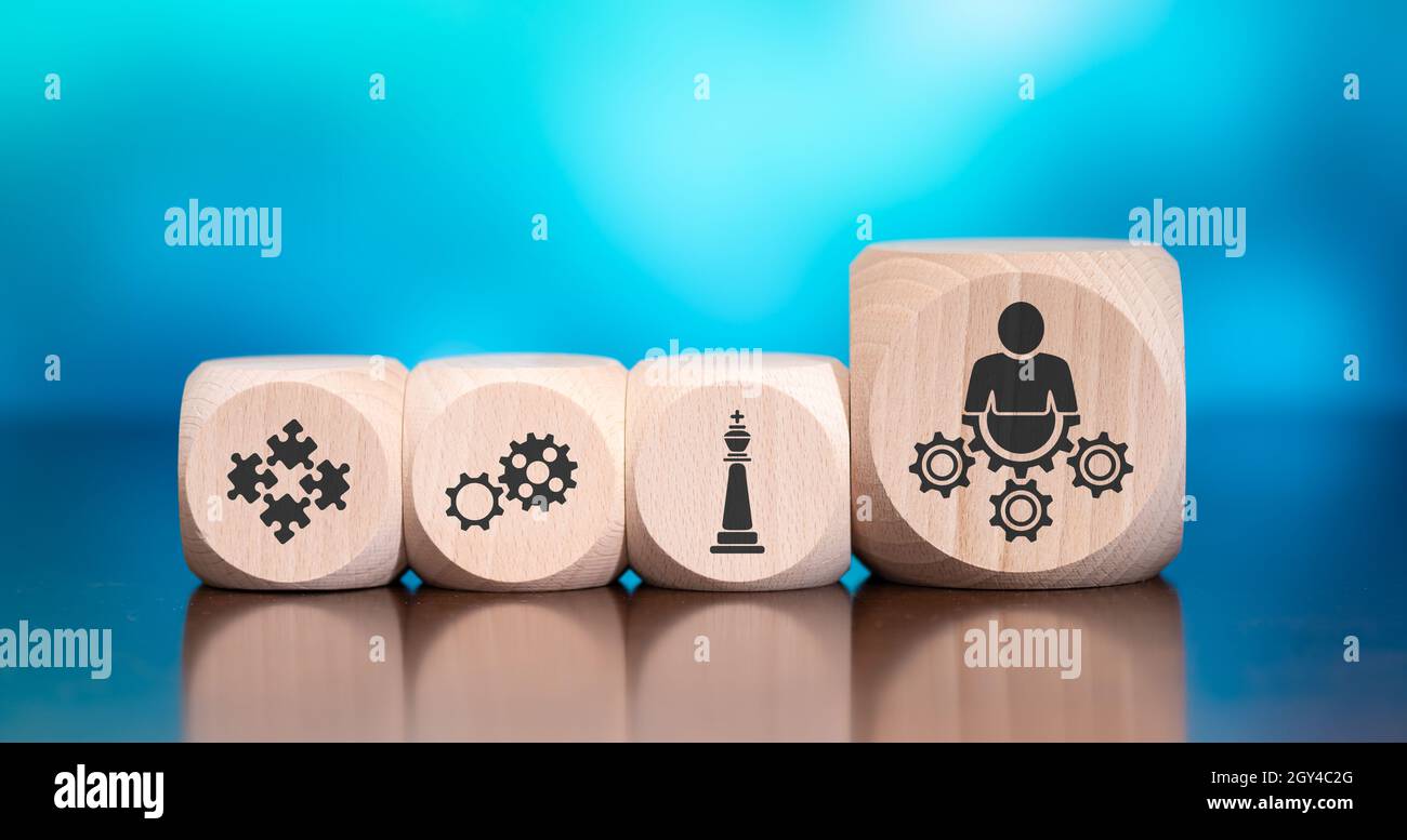 Wooden blocks with symbol of skills concept on blue background Stock ...