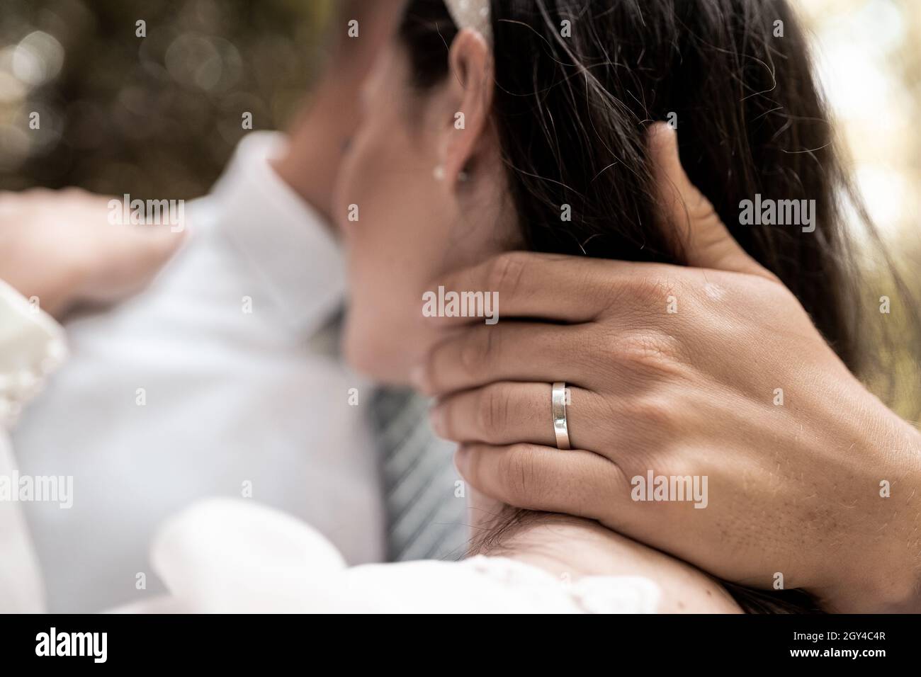 Marry me,wedding picture,the bride and groom are holding each other ...