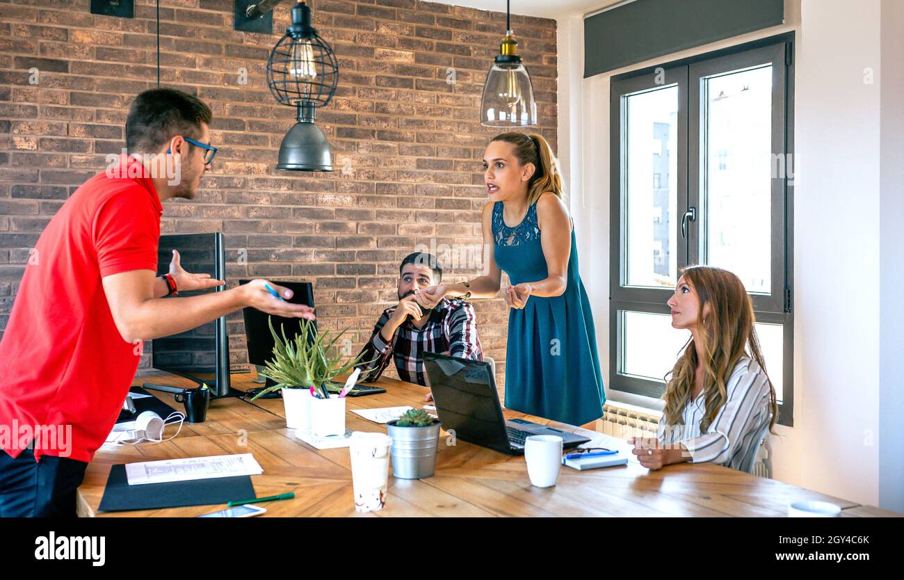 Coworkers arguing in the office Stock Photo - Alamy