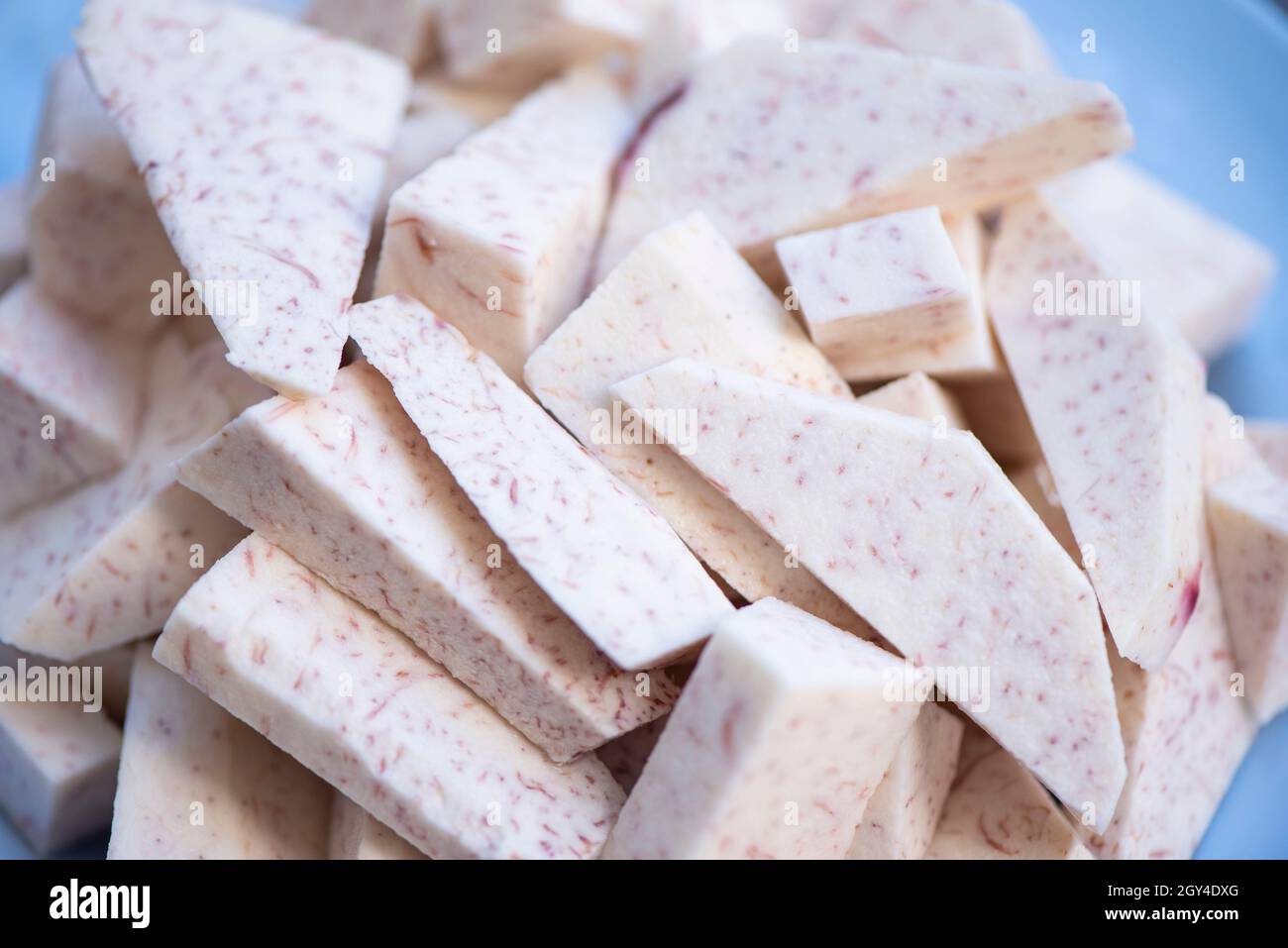 Taro root with slice on plate background, Fresh raw organic taro root ...