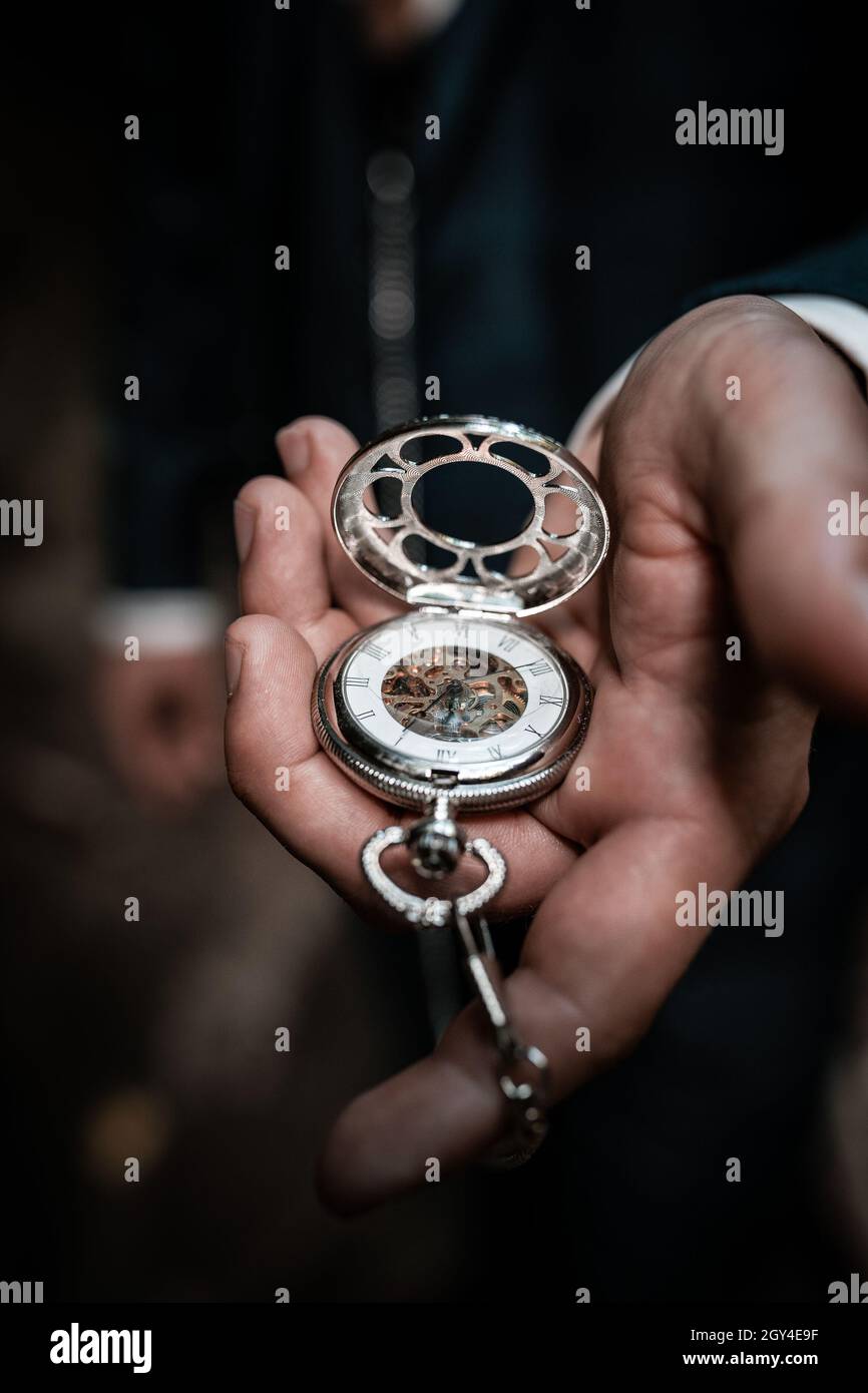 old clock in the hands of a stylish man Stock Photo - Alamy