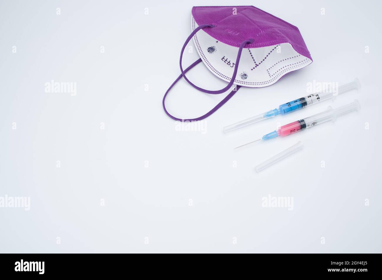 Isolated respiratory mask and syringe on a white background Stock Photo ...