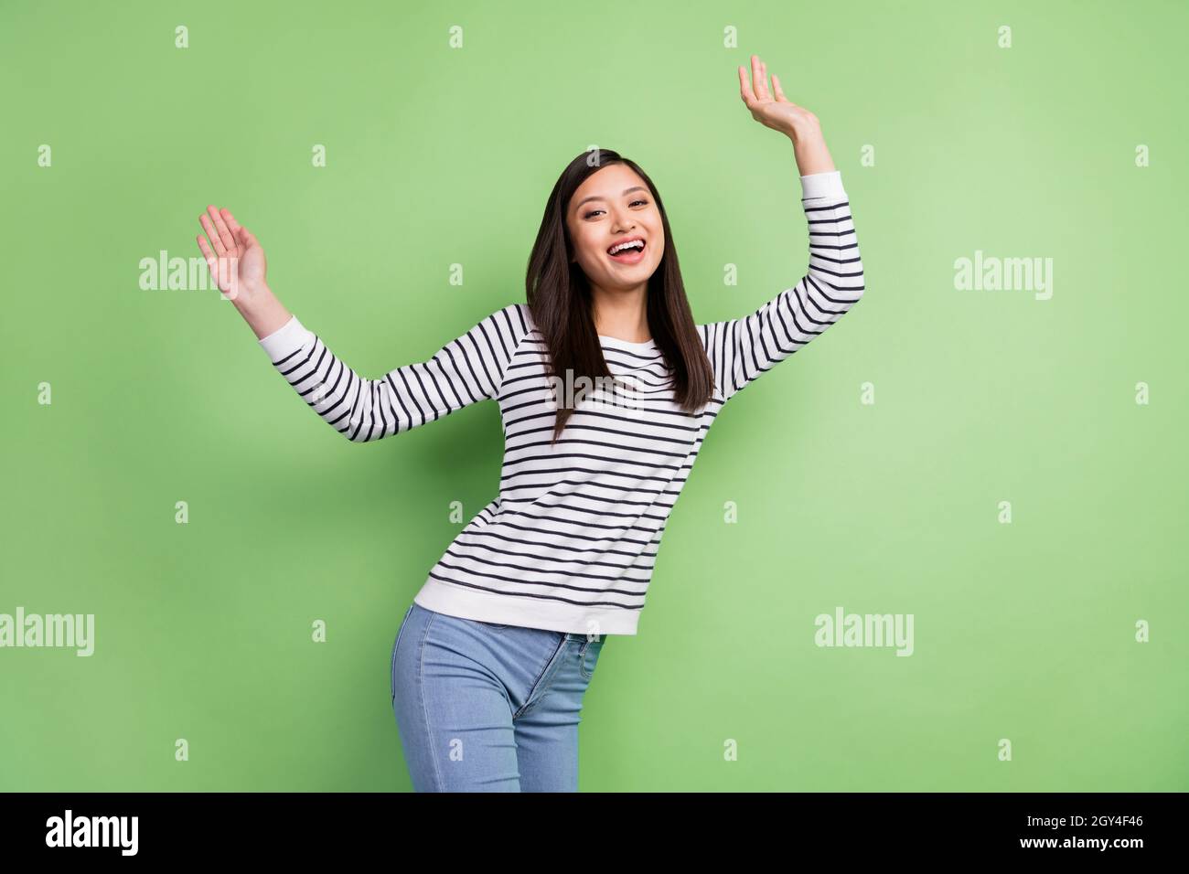 Photo of funny brunette young lady dance wear white shirt isolated on ...