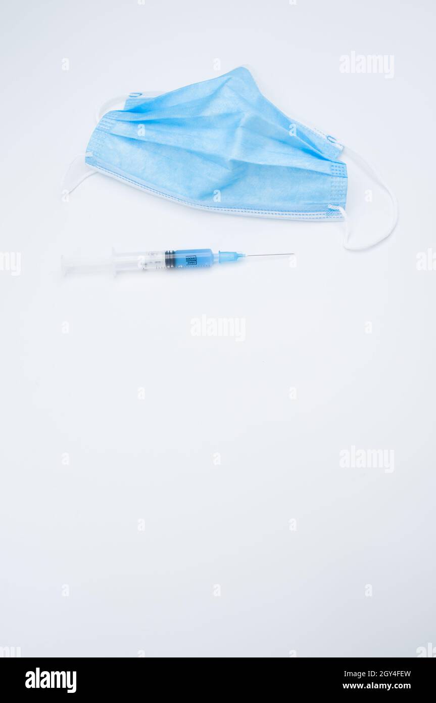 Isolated respiratory mask and syringe on a white background Stock Photo ...
