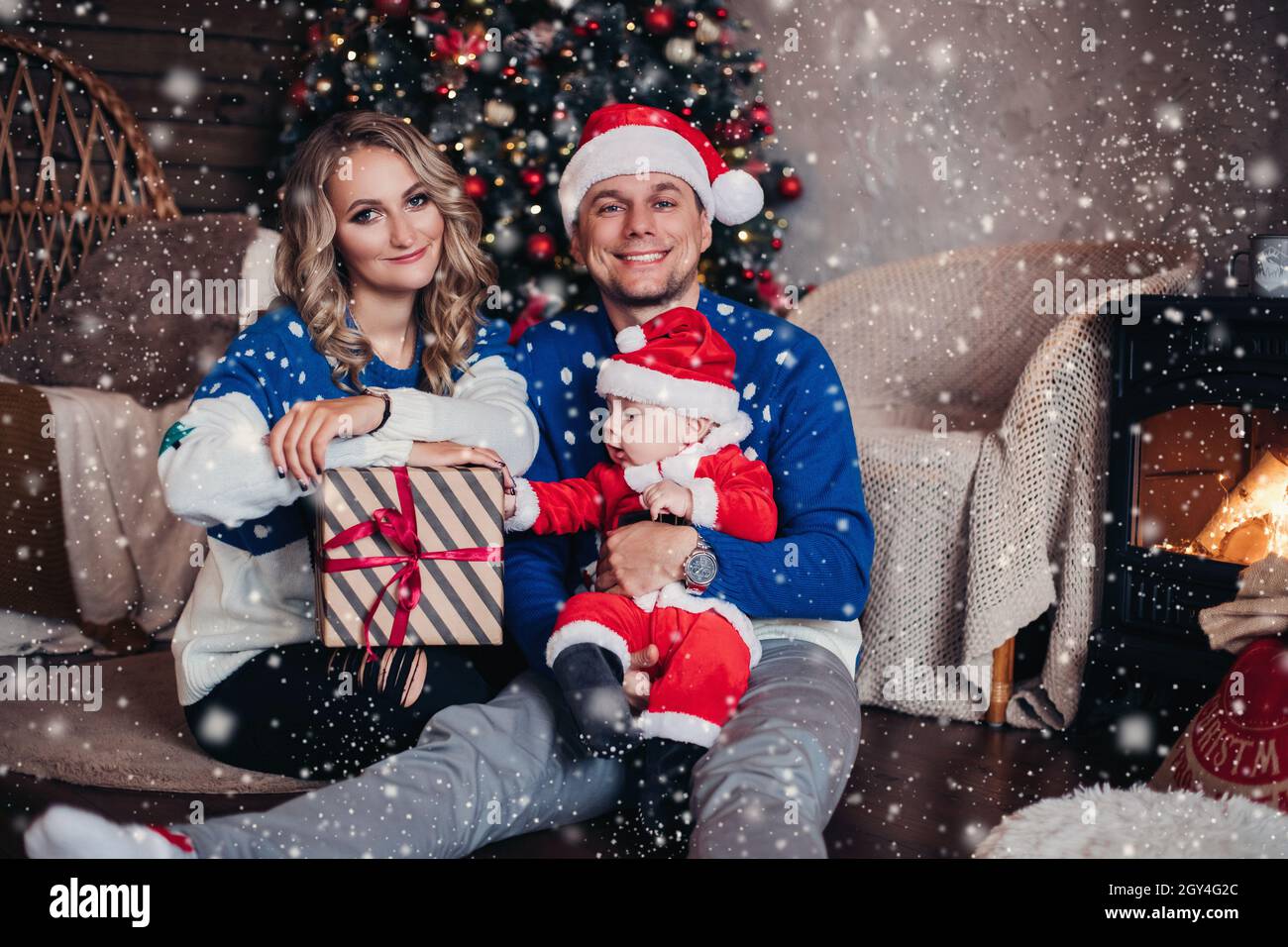 Happy father and son in Santa costume Stock Photo - Alamy