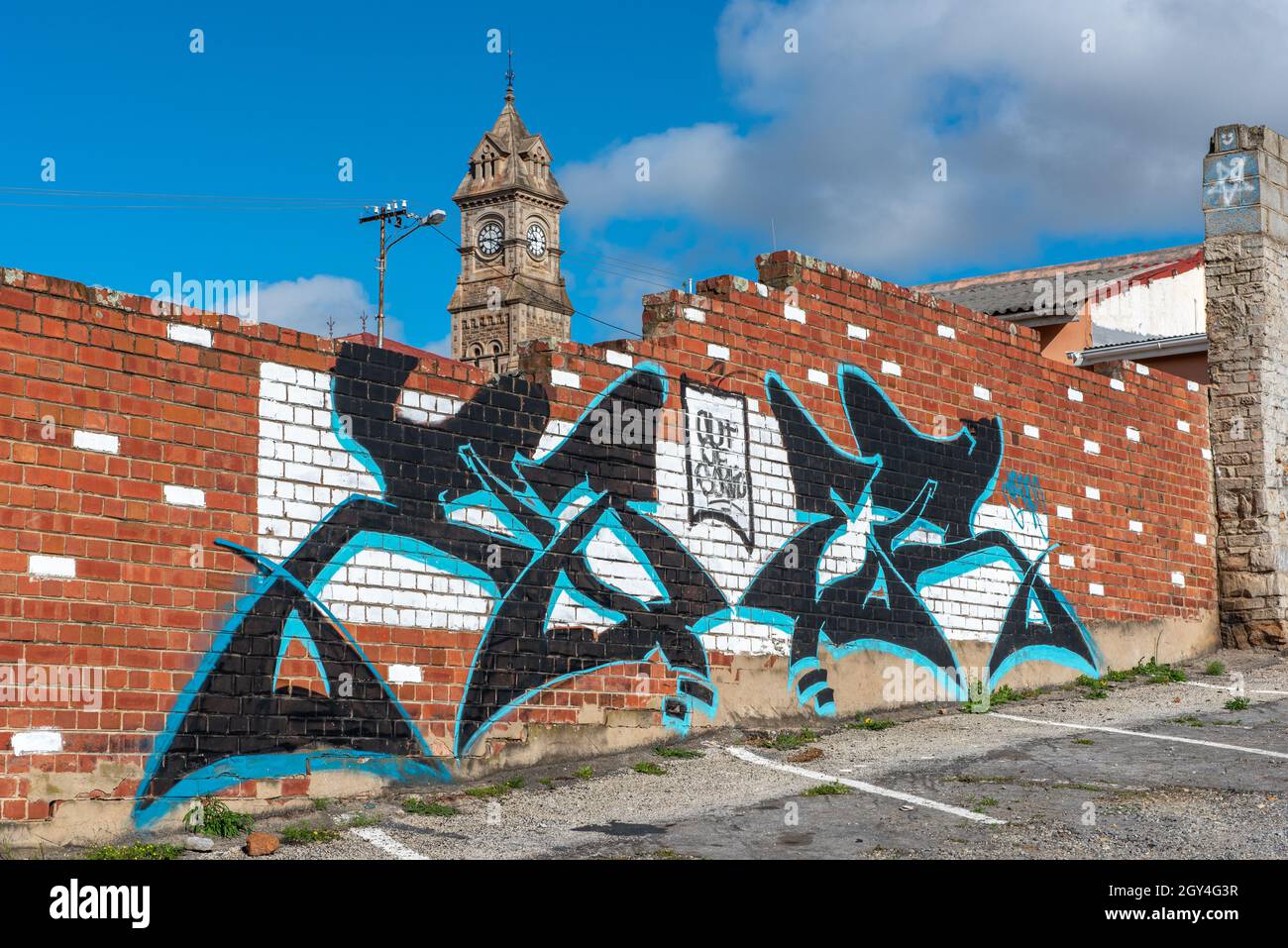 The City Hall in Grahamstown/Makhanda is viewed from behind a wall ...