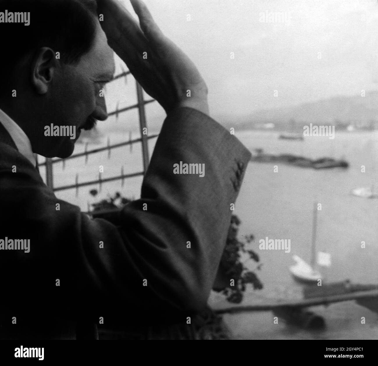 Hitler salutes with the Hitler salute from the window of the Dreesen ...