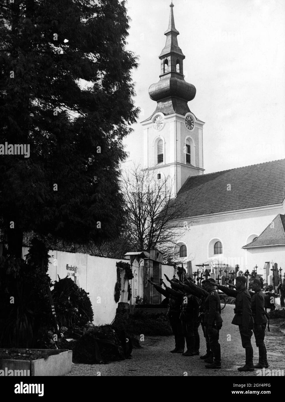 In front of the grave of Adolf Hitler's parents Klara and Alois some ...