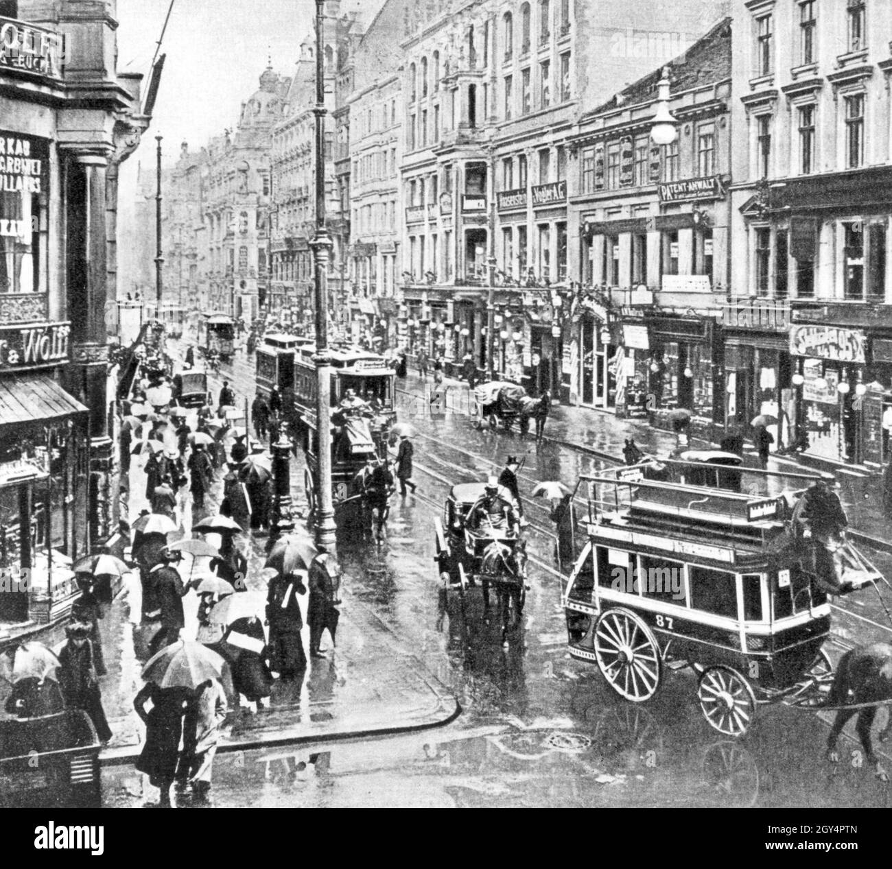 The photograph shows the crowd on Leipziger Straße, corner ...