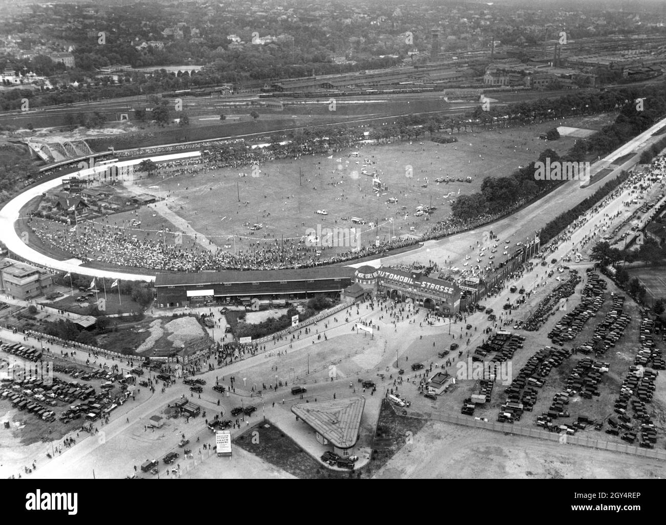 "Crowds have gathered at the race track in Berlin to watch the Avus ...