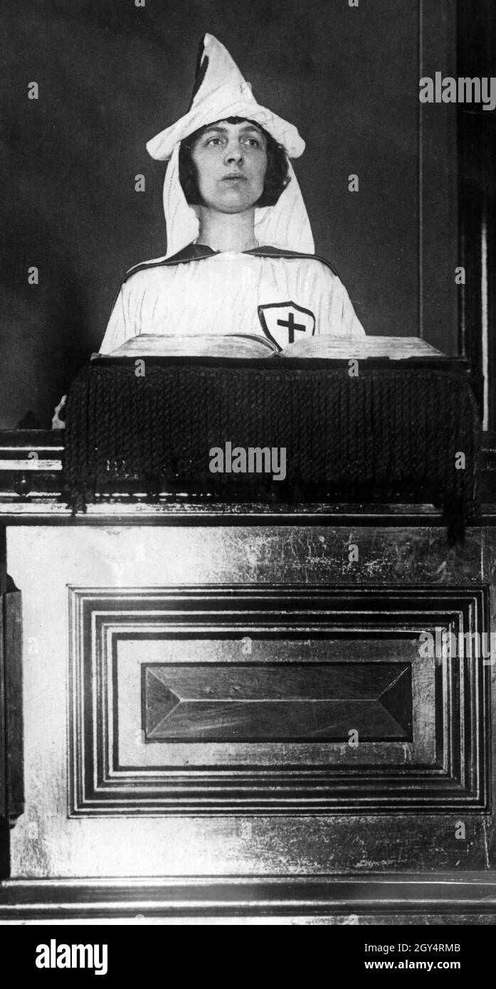 "Leah Bell in the garb of a Klan leader at a Ku Klux Klan meeting. She ...