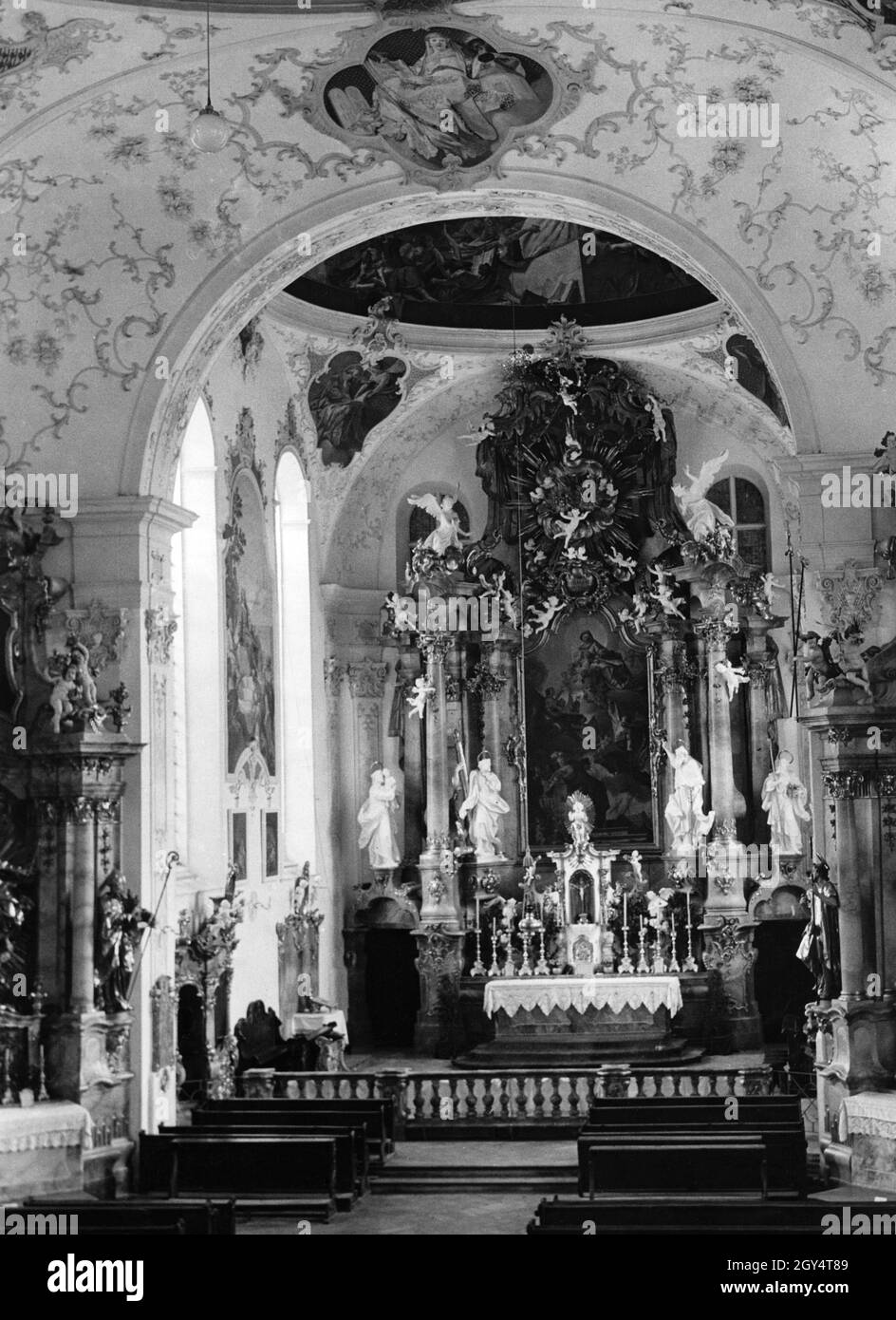 View of the baroque interior of the parish church of St. Peter and Paul in Oberammergau on ...