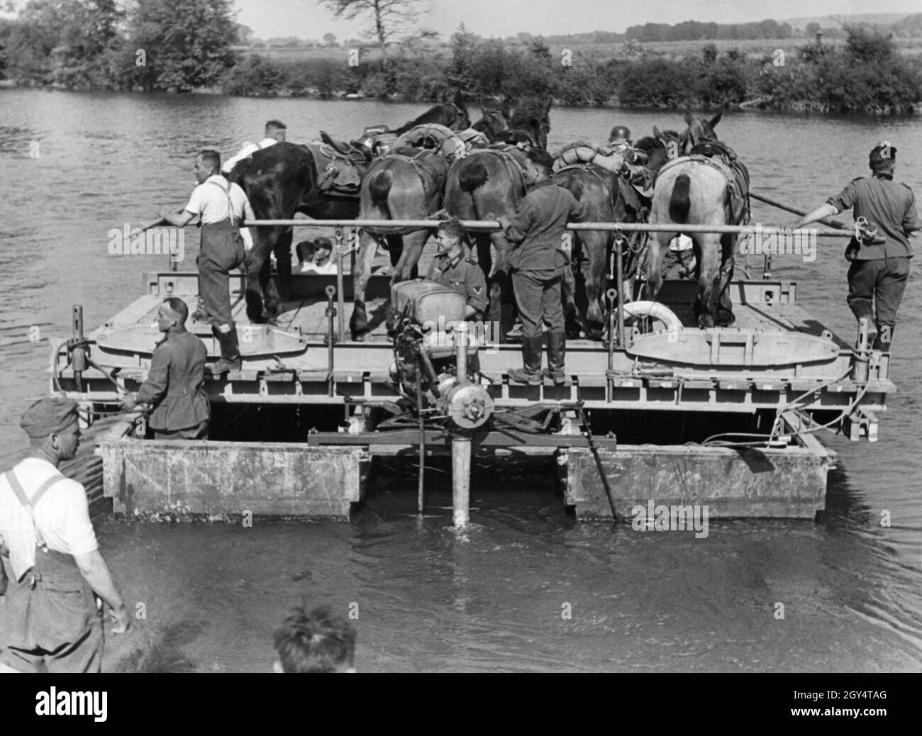Raft with artillery and horses sets across a river. [automated ...