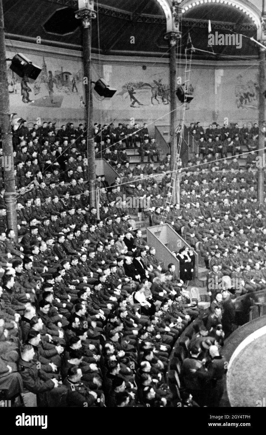 Soldiers of the Wehrmacht attend a guest performance of the Circus ...