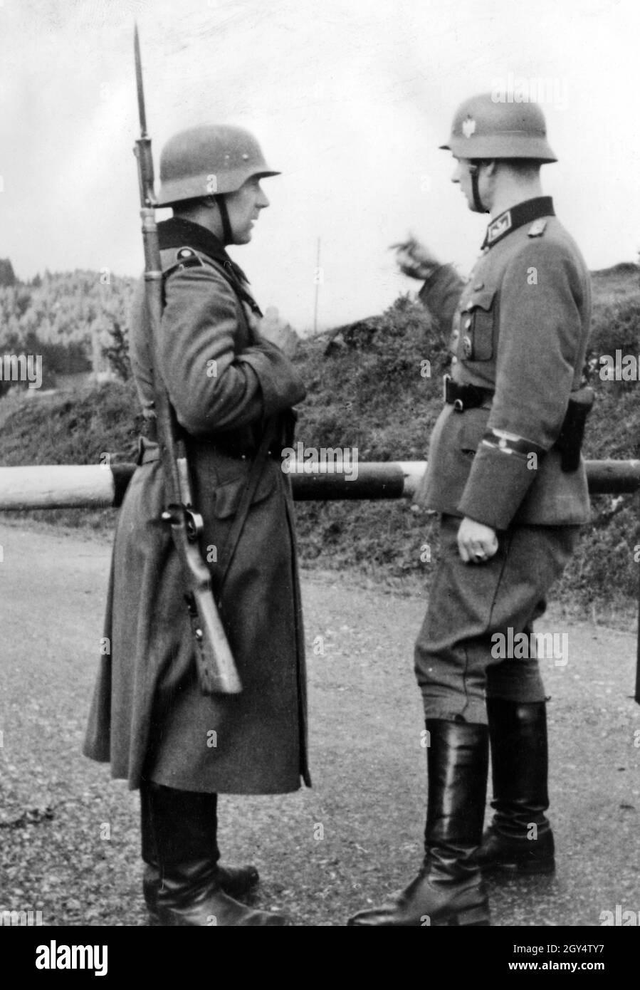 German soldier on guard at the border to the hi-res stock photography ...