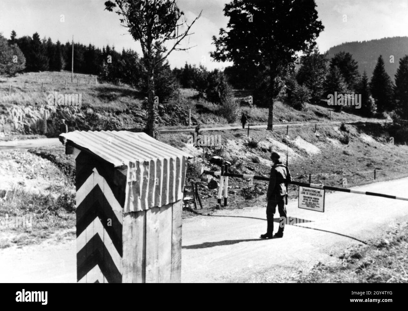 A German border guard guards a border post on the French-Swiss border ...