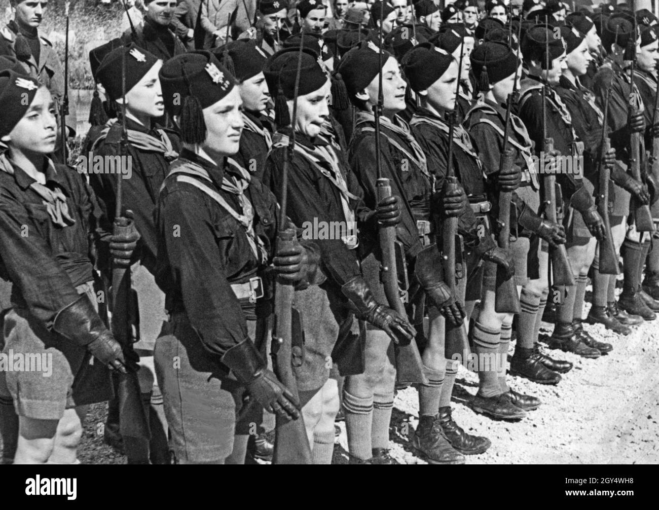 Italian Balilla boys stand in formation in 1938 and present the rifle ...
