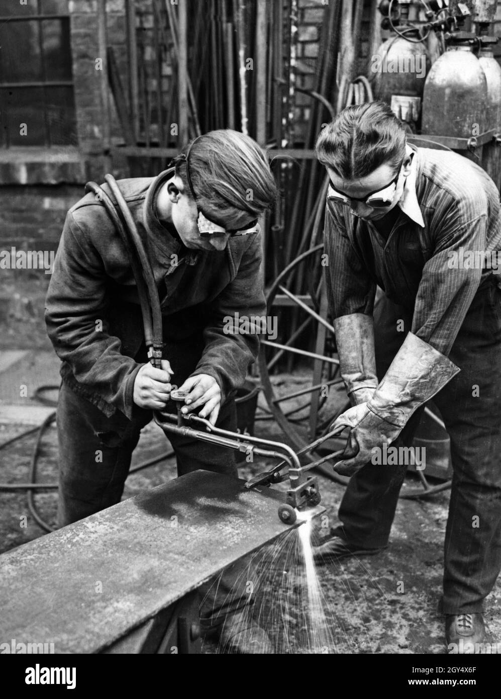 Two welders at work. [automated translation] Stock Photo - Alamy