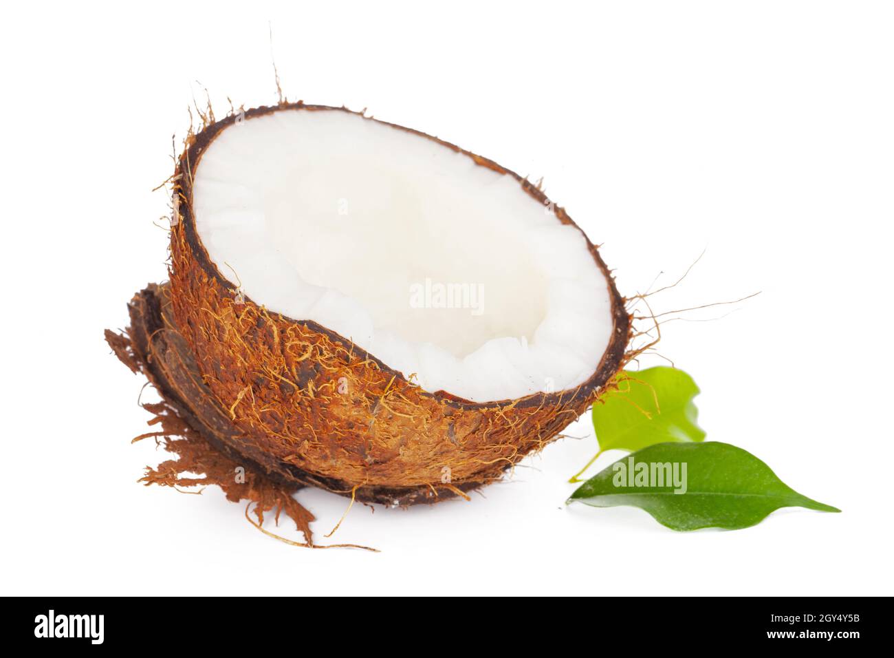 Cracked coconut with leaves isolated on white background Stock Photo ...
