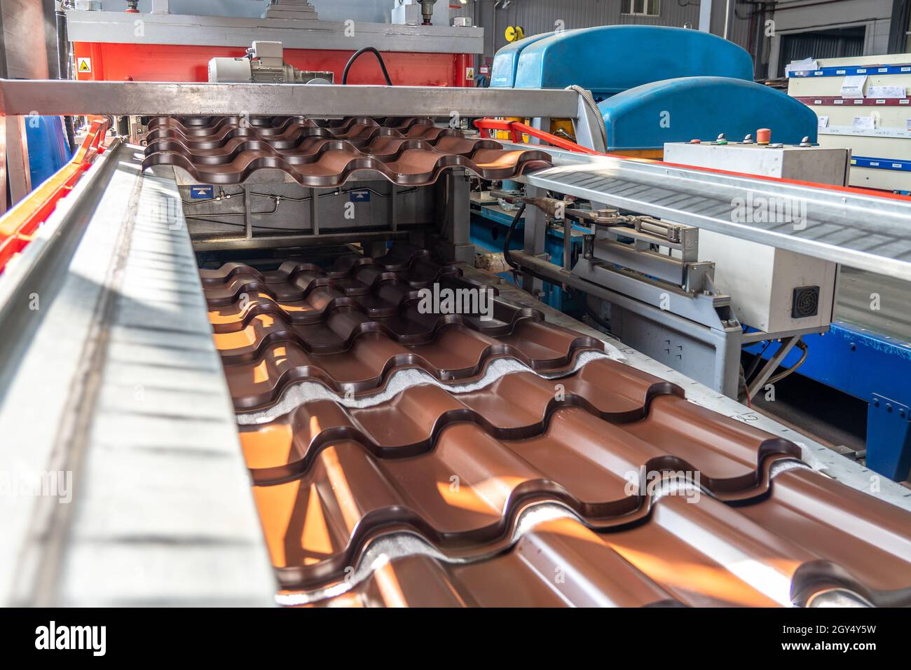 Brown metal roof tiles made from galvanized and painted steel in metal ...