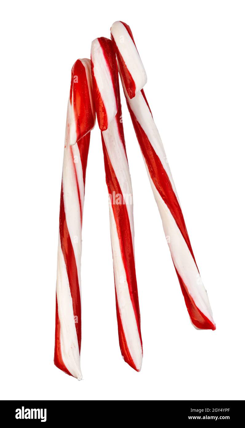 Stack of candy canes isolated on white background Stock Photo - Alamy