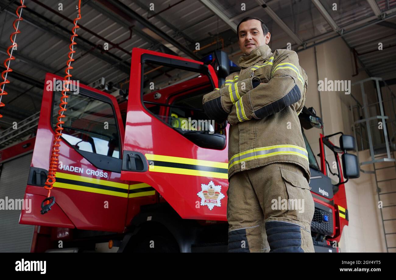 Former football player now fire fighter, Alex Nicholls poses for a ...