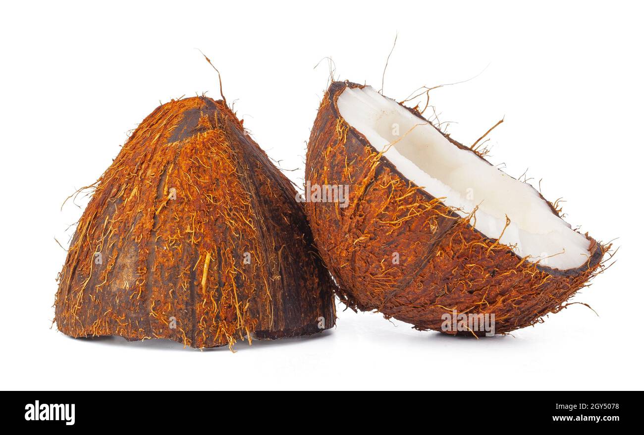 Coco nut halves isolated on white background Stock Photo - Alamy