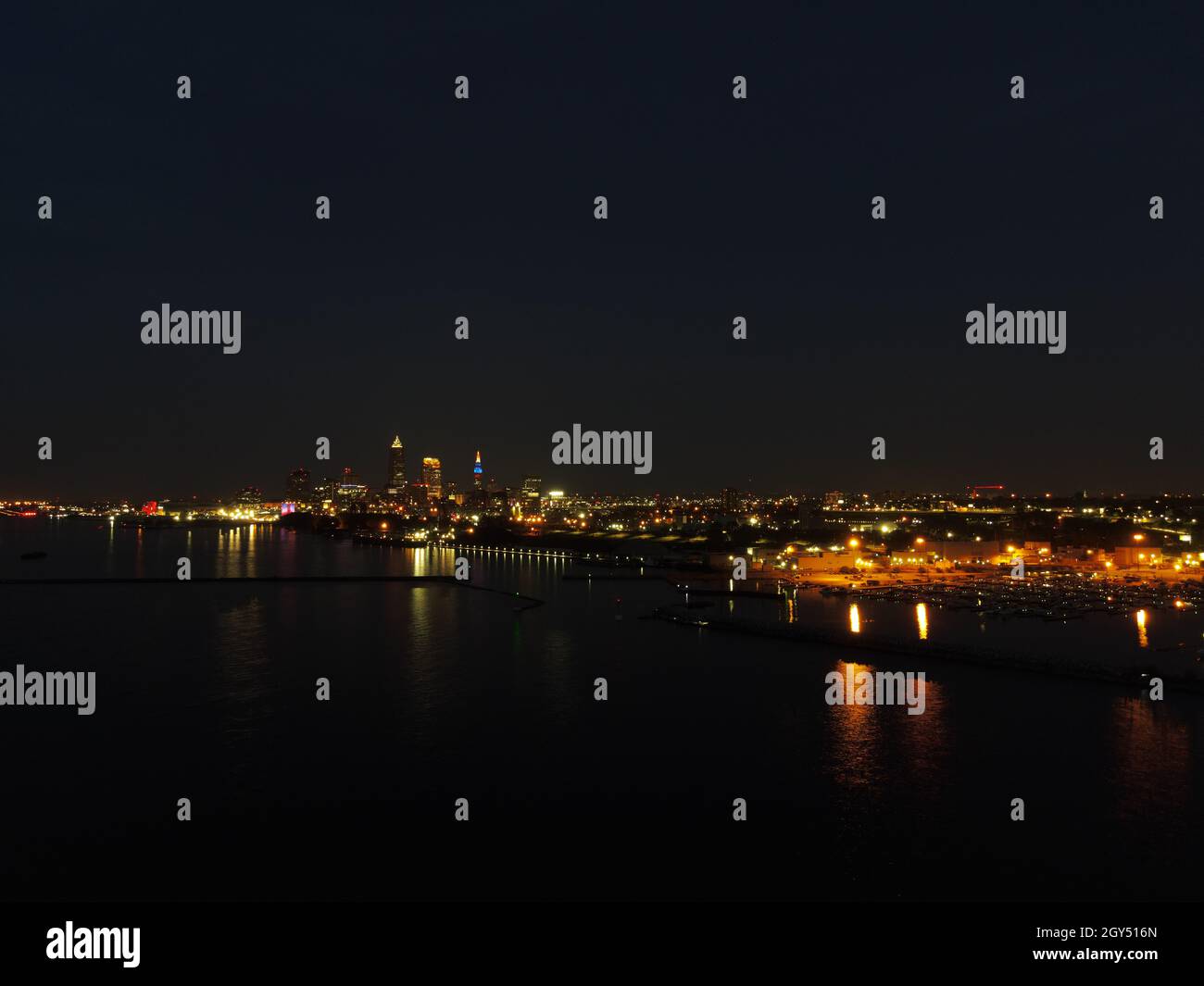 Aerial view of coastal buildings with sparkling night lights Stock ...