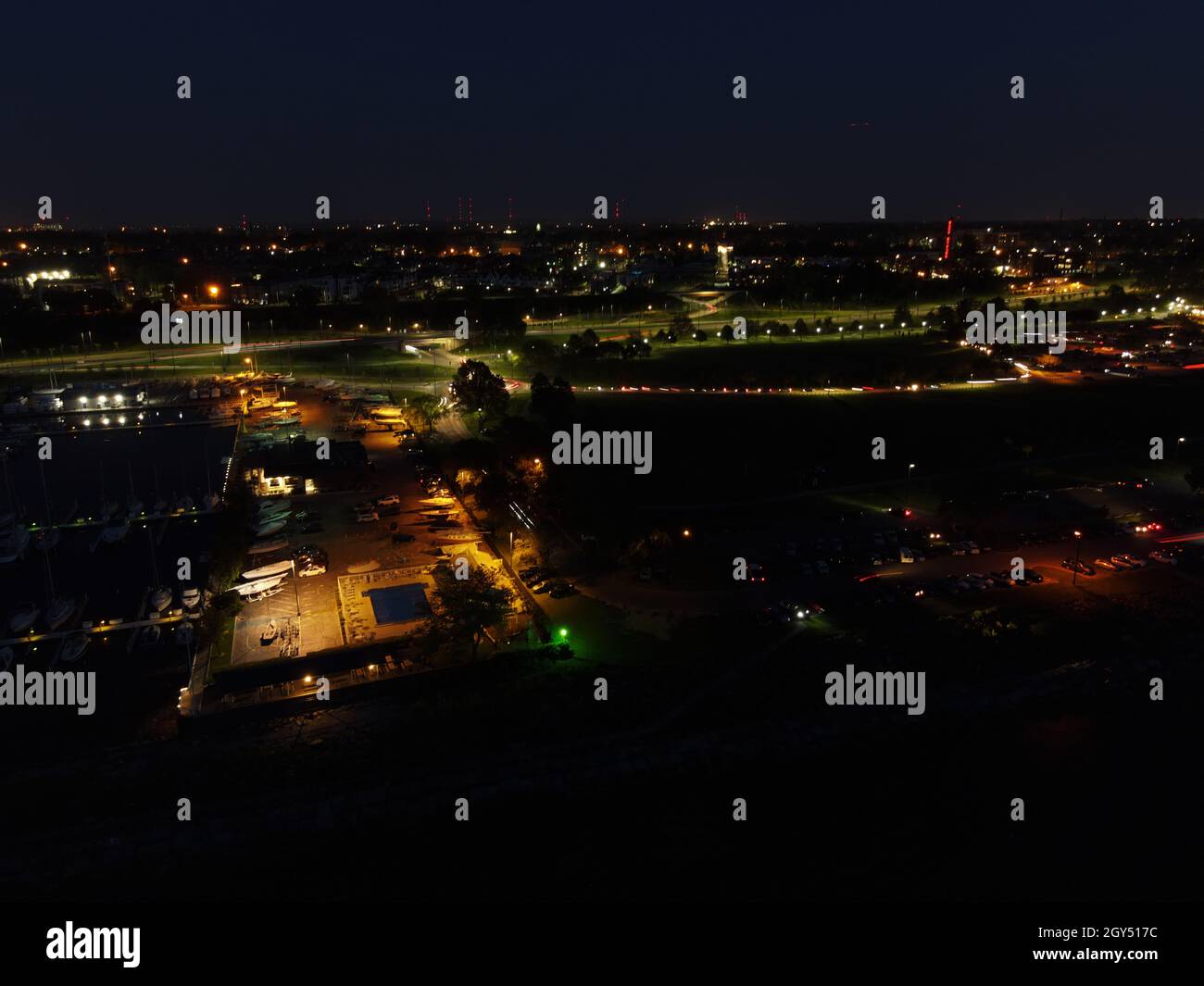 Aerial view of city buildings with sparkling night lights Stock Photo ...