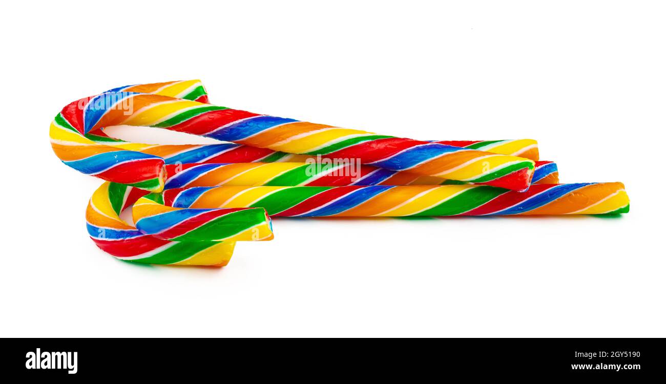 Rainbow colored candy cane isolated on white background Stock Photo - Alamy