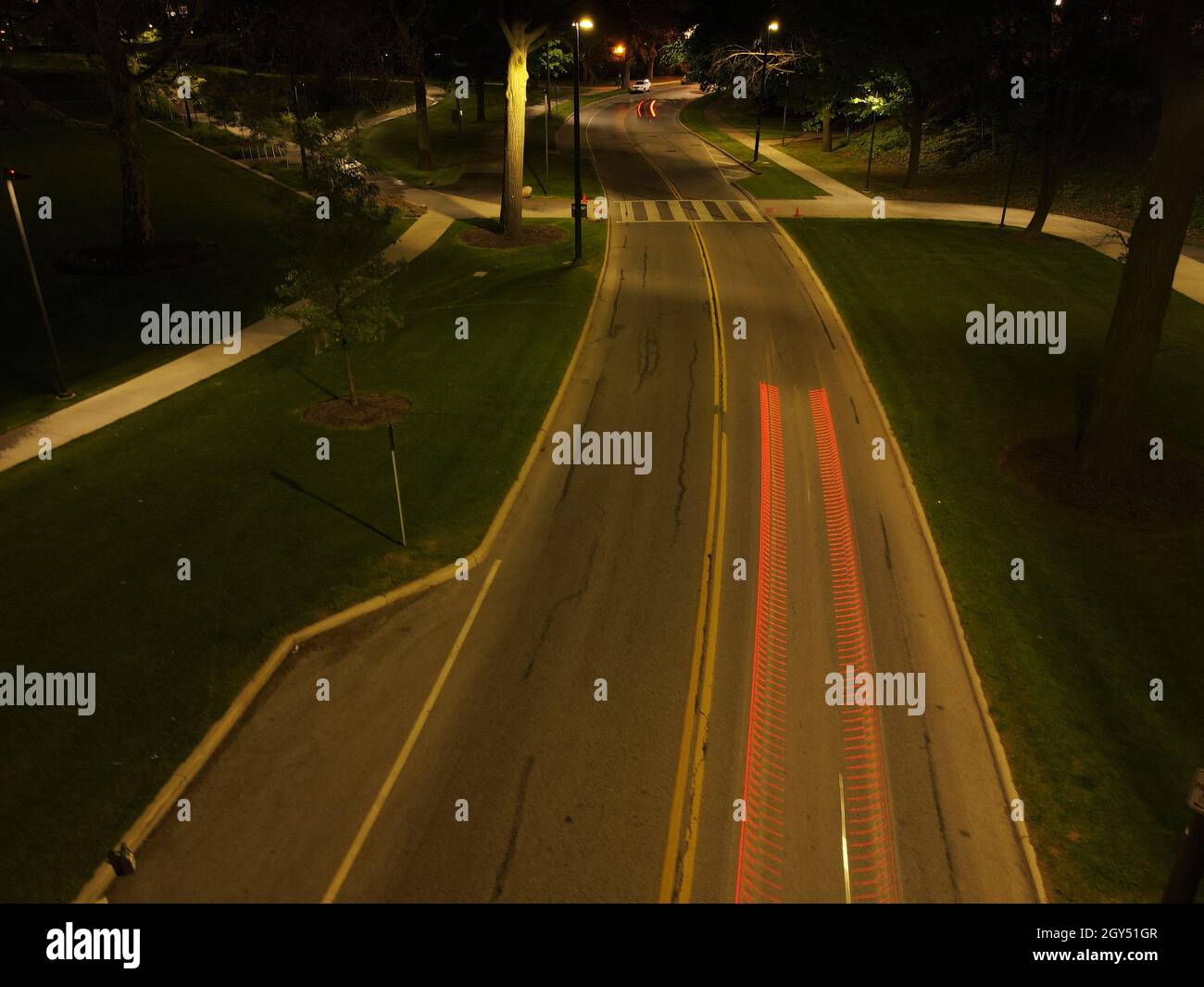 Aerial shot of an empty road at night Stock Photo - Alamy