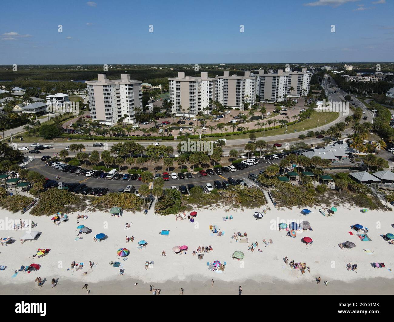 Aerial view of apartment buildings, resorts, and beautiful landscapes ...