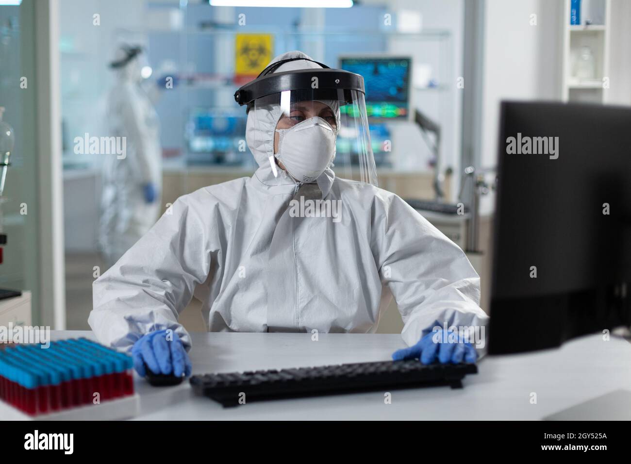 Scientist woman with protection medical equipment against covid19 ...
