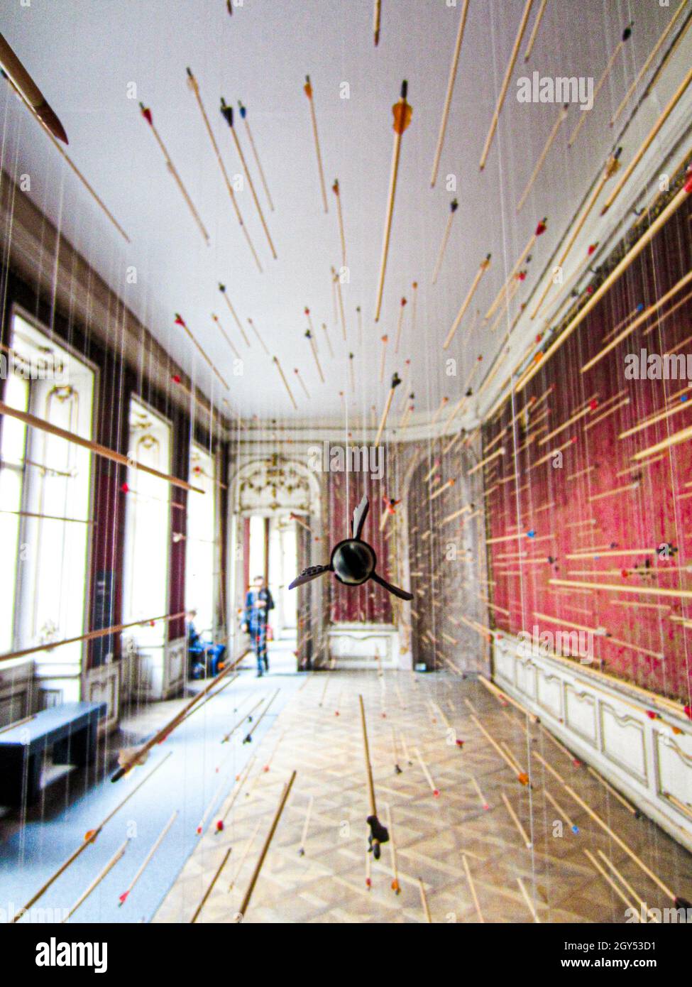 Group of floating arrows on a lobby of a building Stock Photo - Alamy