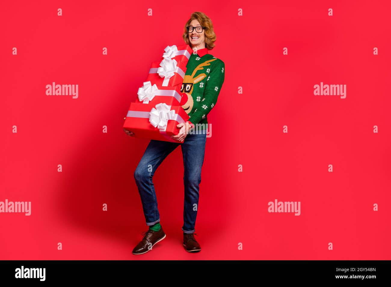 Full length body size view of nice funky cheerful guy nerd carrying ...