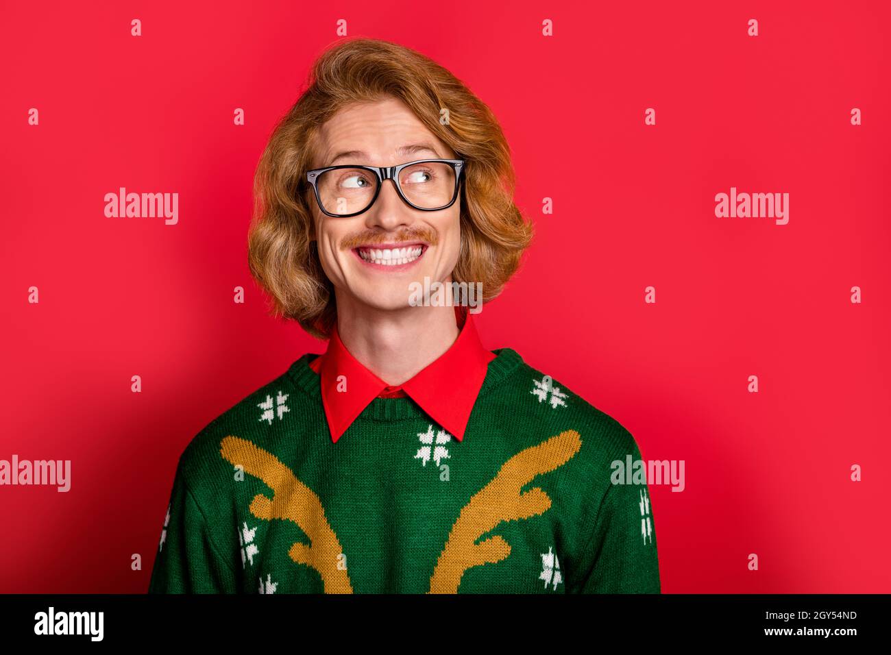 Portrait of attractive cheerful funky guy wearing festal pullover ...