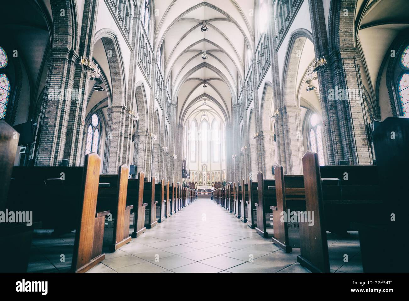 Close up shot of the interiors, design and the wooden desks inside the ...