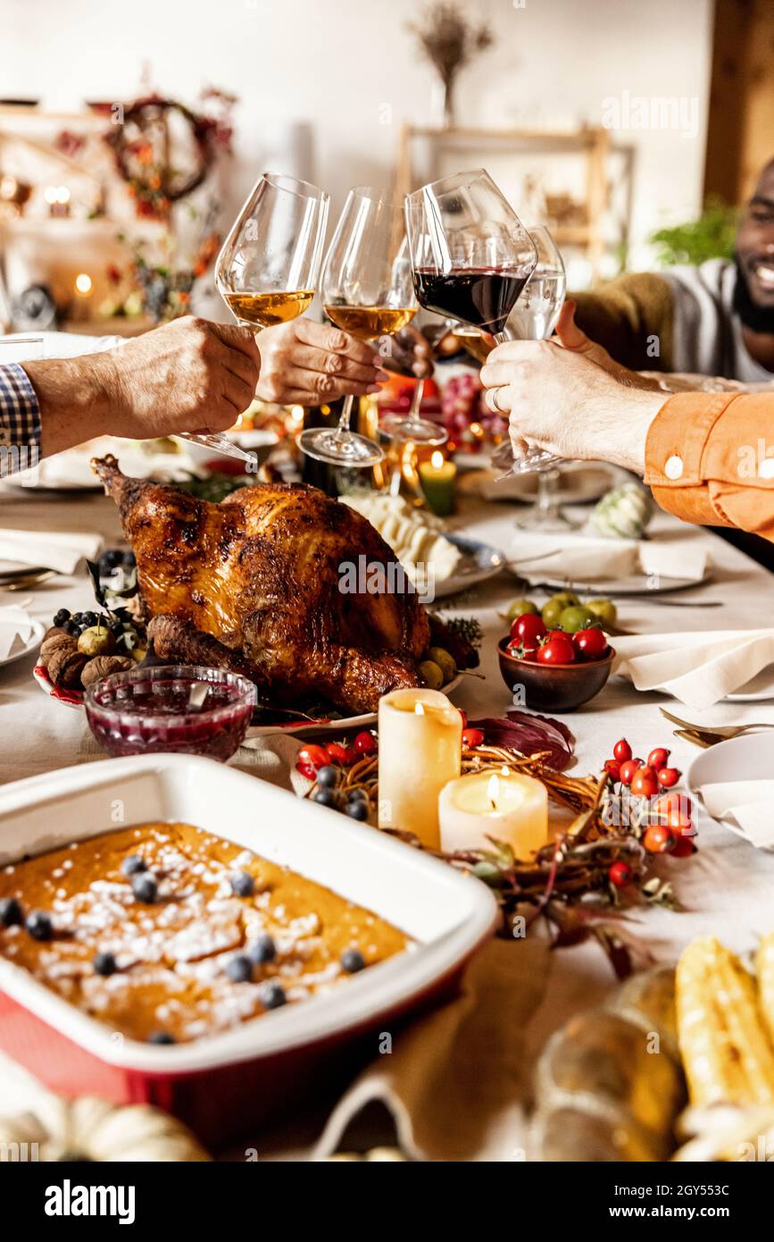 Close-up happy multiethnic big family celebrate Thanksgiving day ...
